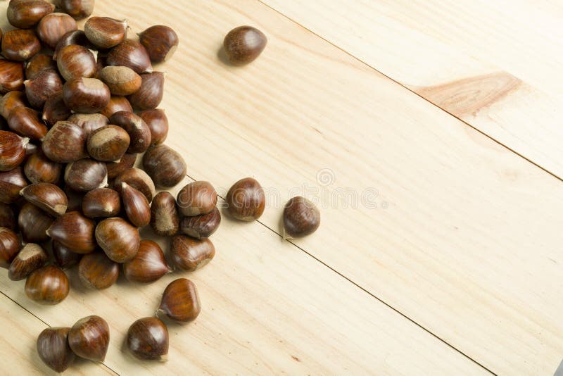 Chestnuts on Pine Wood Background. Stock Image - Image of vegetarian ...