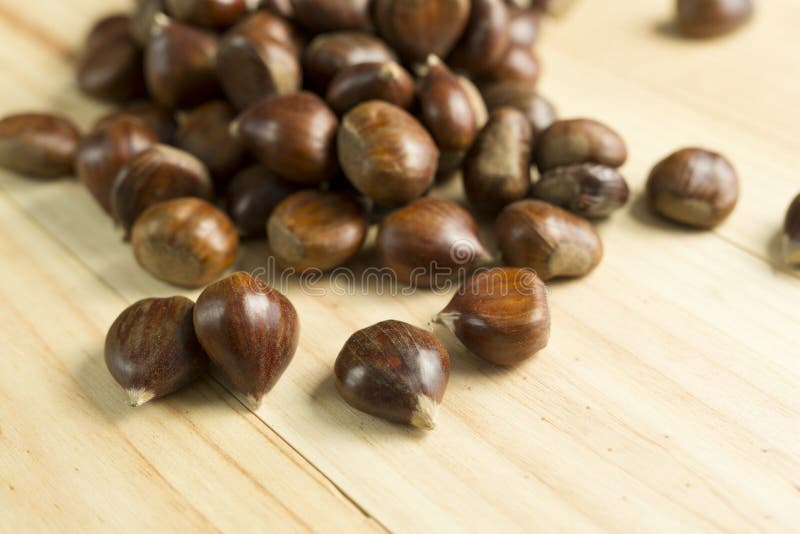 Chestnuts on Pine Wood Background. Stock Image - Image of healthy, food ...