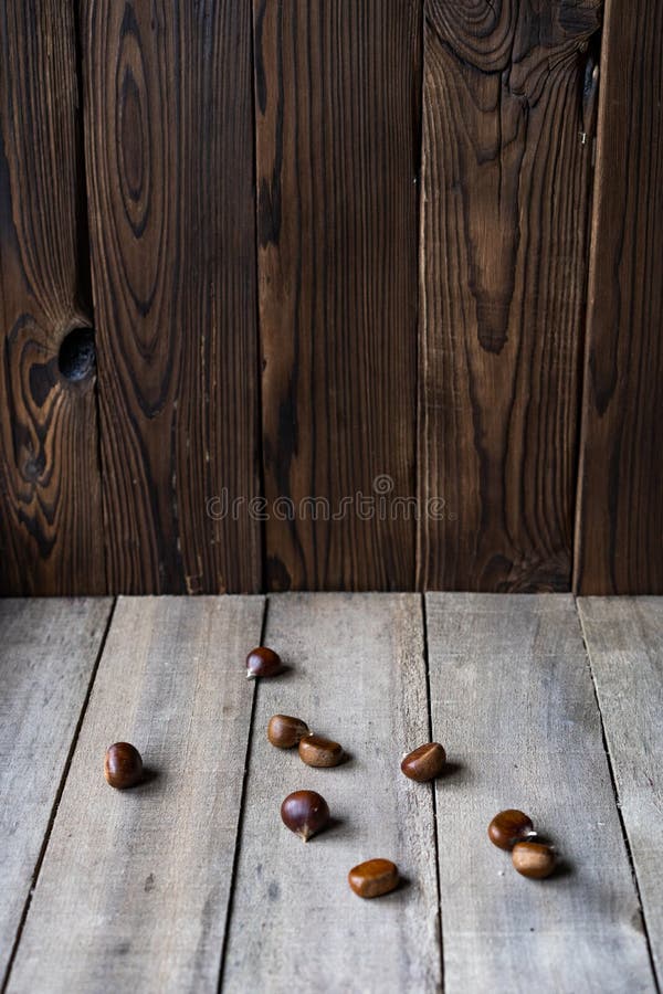 Chestnuts on the Wooden Background Stock Photo - Image of cookery ...
