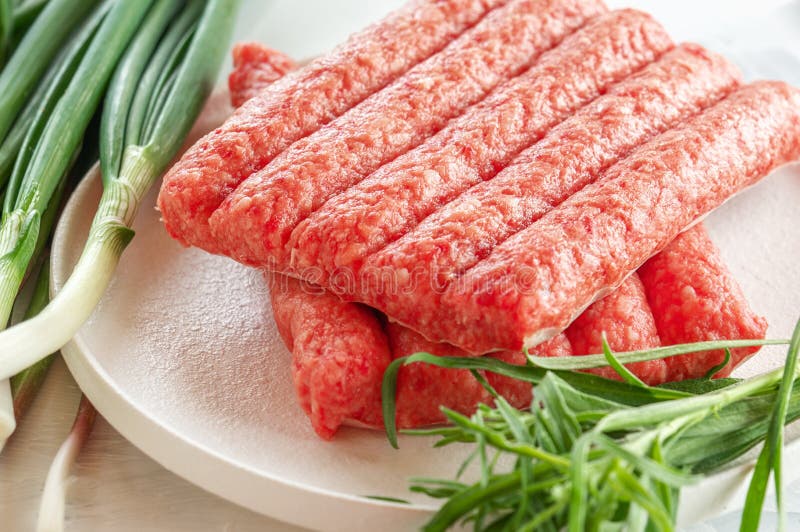Chevapchichi is a National Balkan Dish. Close Up a Row of Fresh Raw ...