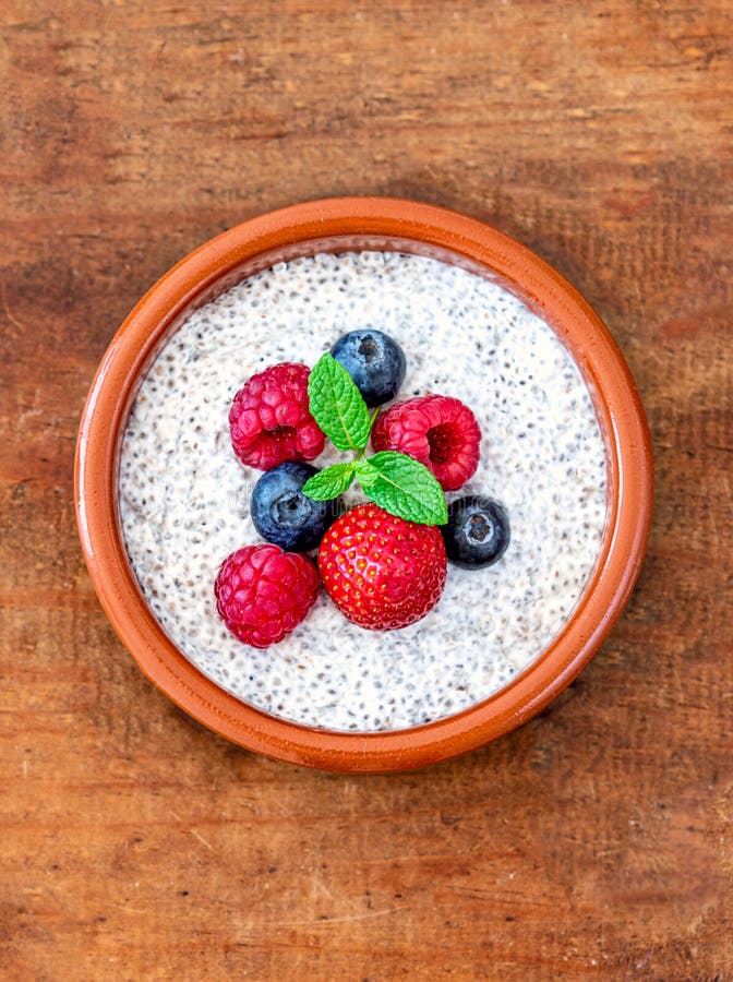 Chia Seed Pudding Made with Fresh Berries on Wooden Table. Chia Seeds ...