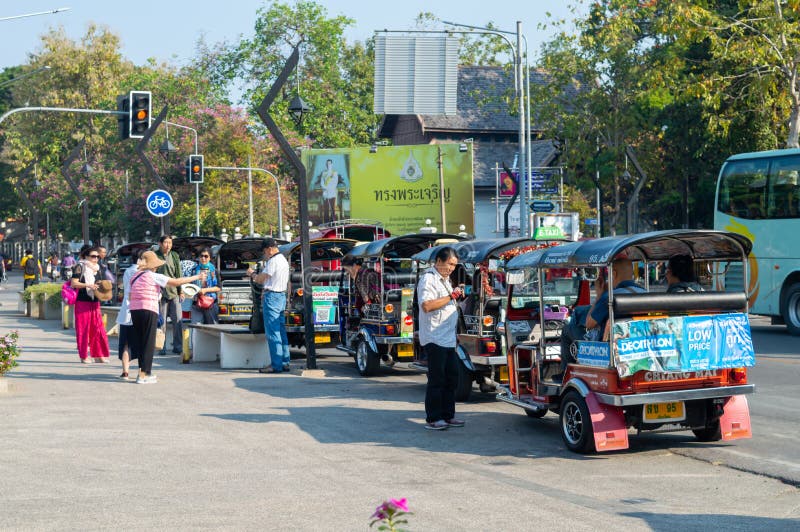 CHIANG MAI THAILAND-10 JANUARY 2020:a Group of Tourists Who Take a Tuk ... CHIANG MAI THAILAND-10 JANUARY 2020:a Group of Tourists Who Take a Tuk ...