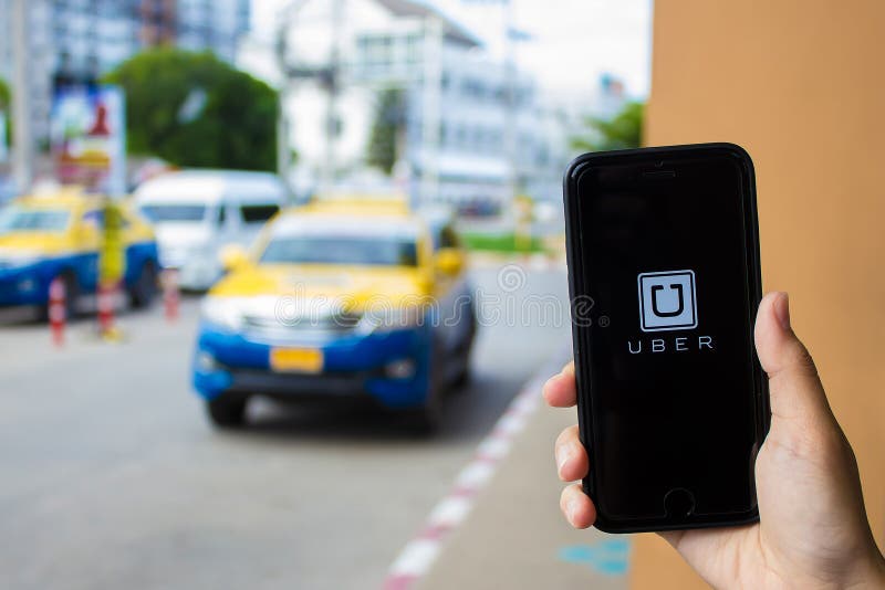 CHIANG MAI, THAILAND - JUN 13, 2016 : a MAN Hand Holding Uber App ...