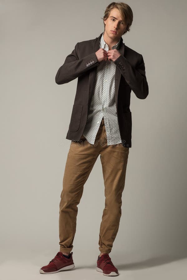 Chic Man in White Skirt and Brown Jacket and Trousers. Stock Image ...