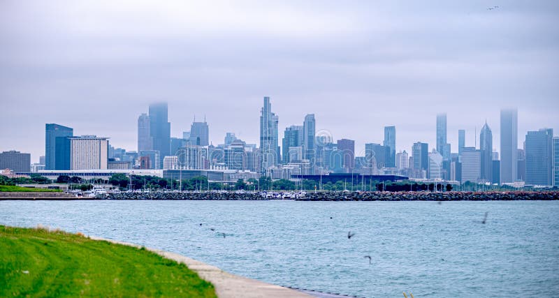 Chicago City Skyline Over Bay on a Cloudy Day Stock Photo - Image of ...