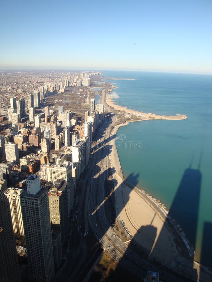 Chicago skyline in shadows stock image. Image of water - 12833973