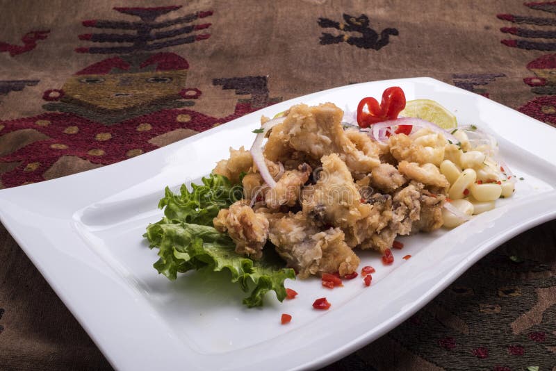 Chicharon Breaded Fried Fish ,and Corn Aji with Symbol Dish of Peruvian ...