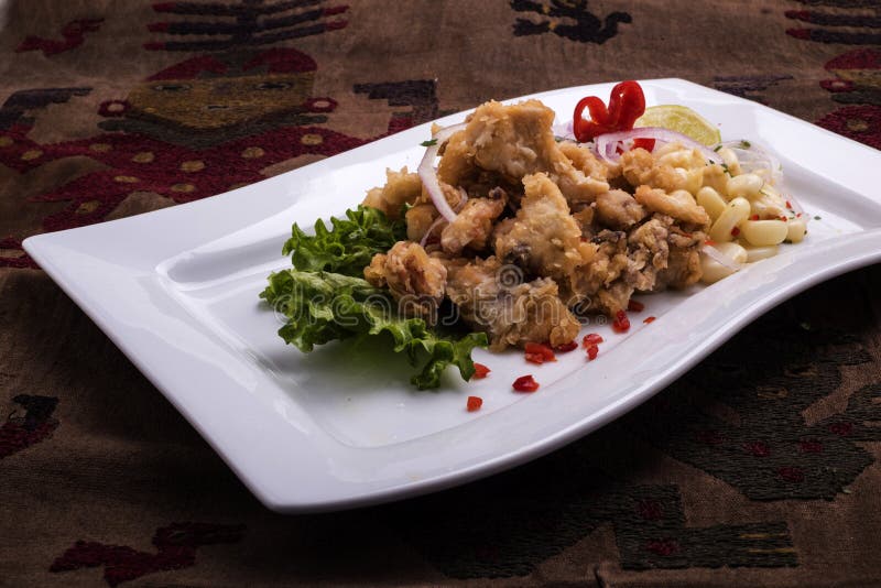 Chicharon Breaded Fried Fish ,and Corn Aji with Symbol Dish of Peruvian ...