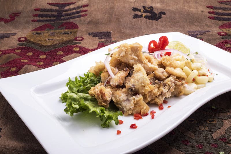 Chicharon De Pescado is a Peruvian Food of Fried Marinated Fish with ...