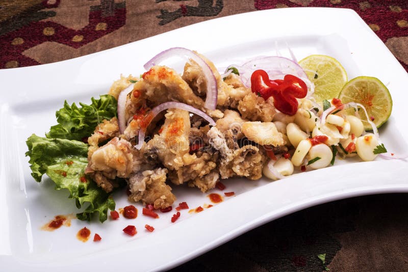 Chicharon De Pescado is a Peruvian Food of Fried Marinated Fish with ...