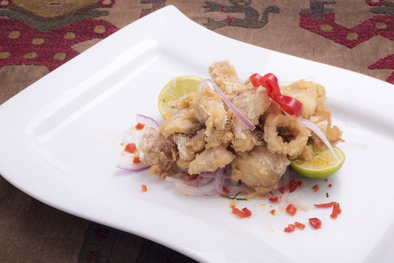 Chicharon De Pescado is a Peruvian Food of Fried Marinated Fish with ...