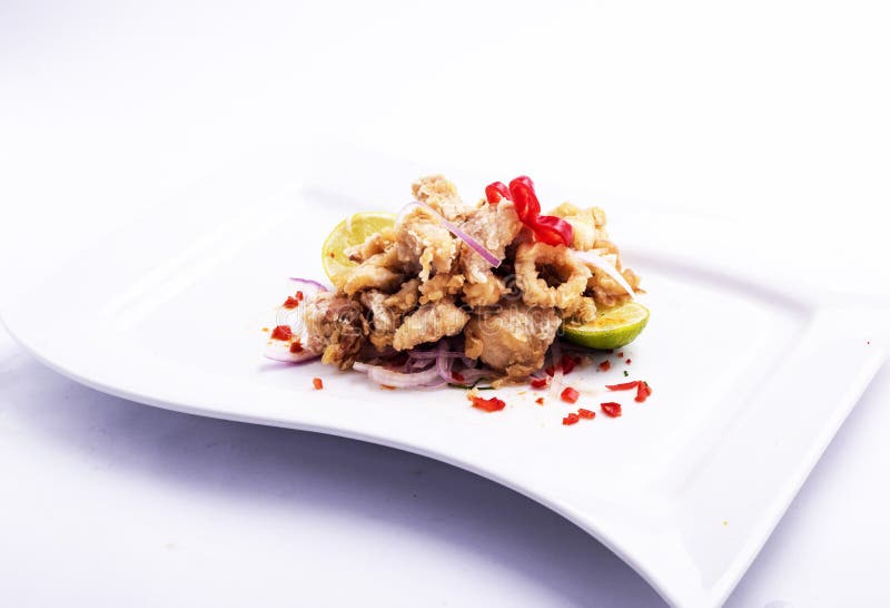 Chicharon De Pescado is a Peruvian Food of Fried Marinated Fish with ...