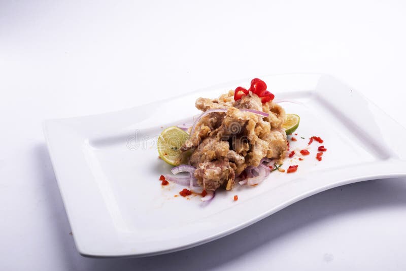 Chicharon De Pescado is a Peruvian Food of Fried Marinated Fish with ...