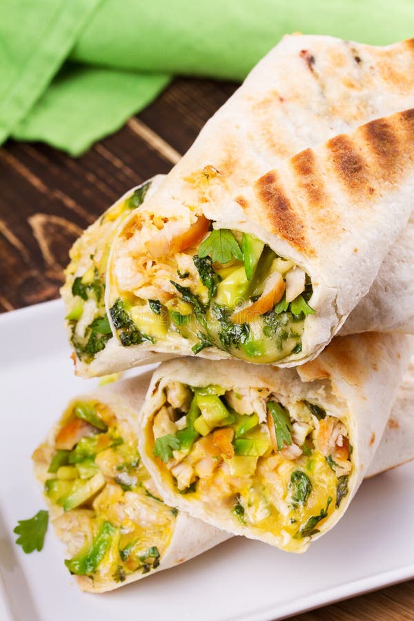 Chicken, Avocado, Cilantro and Cheese Burritos. Stock Photo - Image of ...