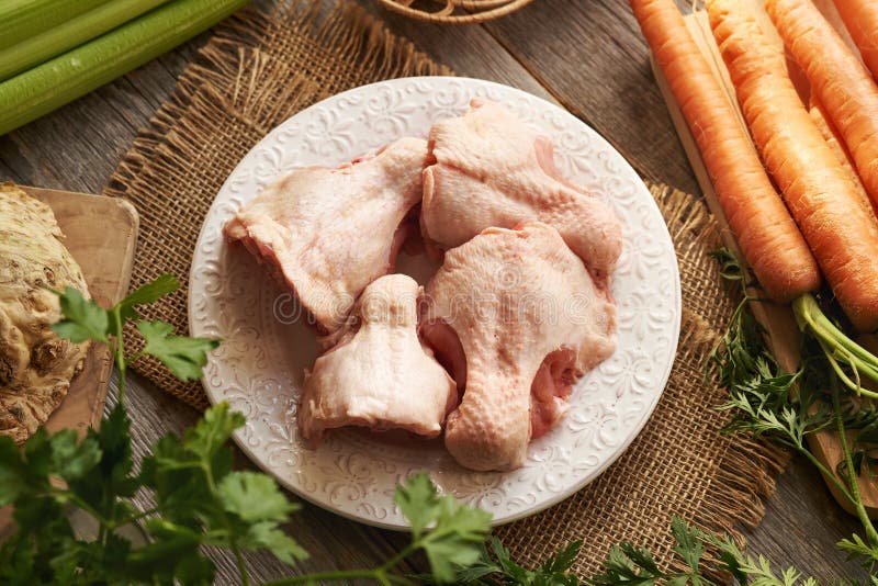 Chicken Backs and Fresh Vegetables - Ingredients for Preparing Homemade ...