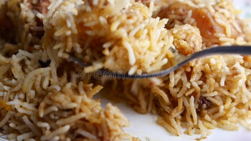 Spoon Pick Mutton Biryani Meal in a Plate on Table. Stock Video - Video ...
