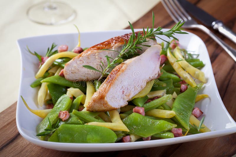 Chicken breast on beans stock photo. Image of meat, rosemary - 54391506