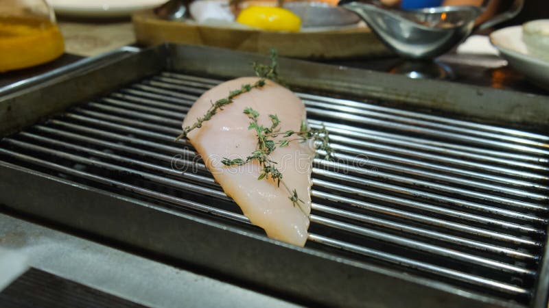 Chicken Breast Grilled on Professional Grill. Hot Grill Slice Hands ...
