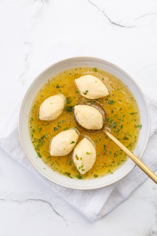 Chicken Broth, Clear Bouillon Soup with Semolina Dumplings Stock Photo ...