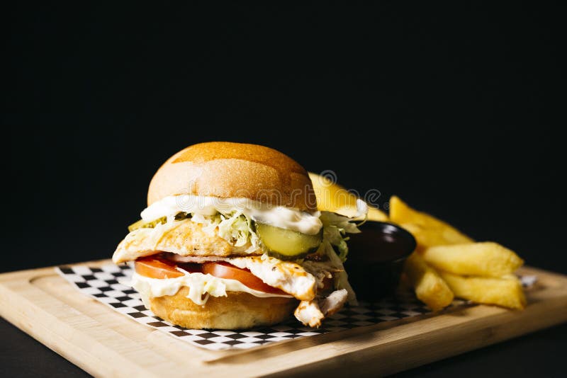 Chicken Burger Over a Black Background Stock Image - Image of away ...