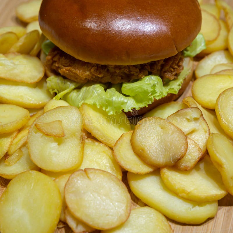 Chicken Burger with Potatoes Stock Image - Image of dinner, lettuce ...