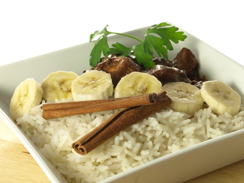 Chicken in Chocolate, Bananas, Rice Stock Image - Image of dinner ...