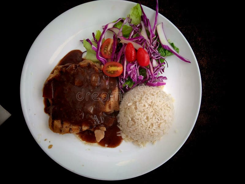 Chicken chop with rice stock image. Image of delicious - 129180097