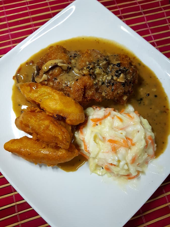 Chicken Chops with Fried Potato and Coleslaw Stock Photo - Image of ...