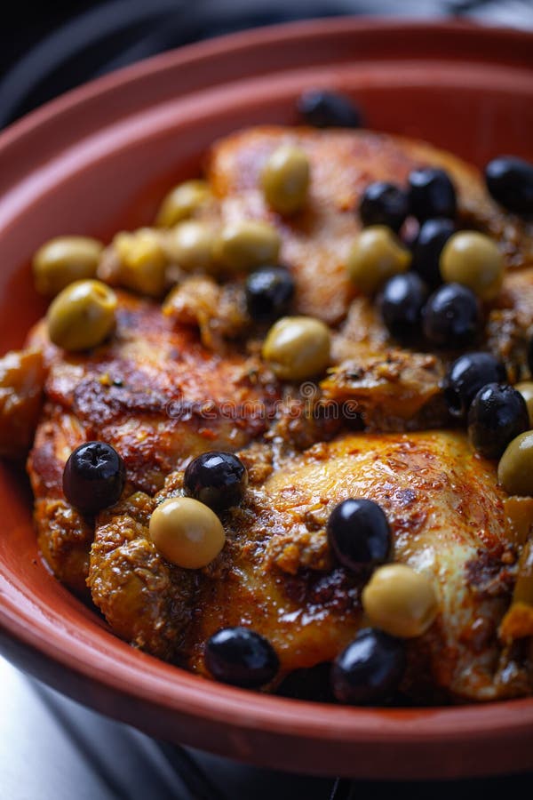Chicken Cooked with Olives in Tagine. Stock Image - Image of olive ...