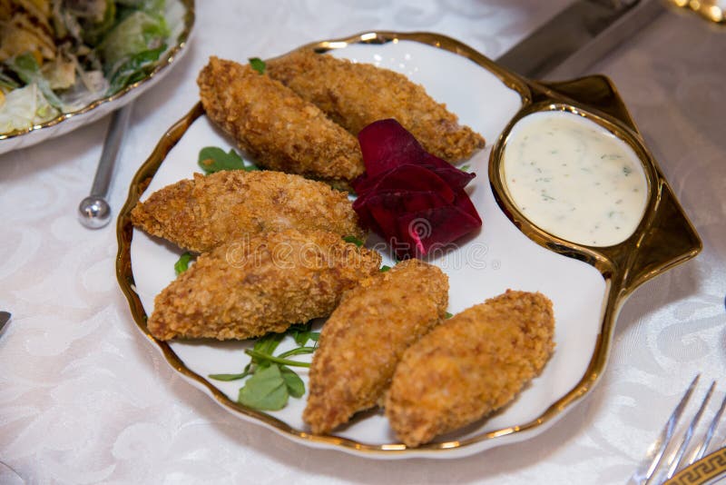 Chicken cutlets on a plate stock photo. Image of gourmet - 366100438