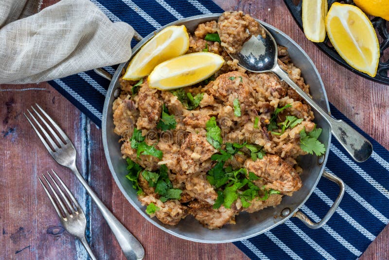 Chicken and date pilaf stock photo. Image of onion, fresh - 357057180