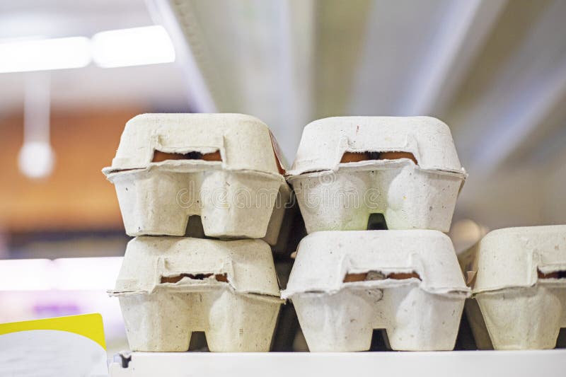 Chicken Eggs in a Cardboard Container on the Counter in the Supermarket ...