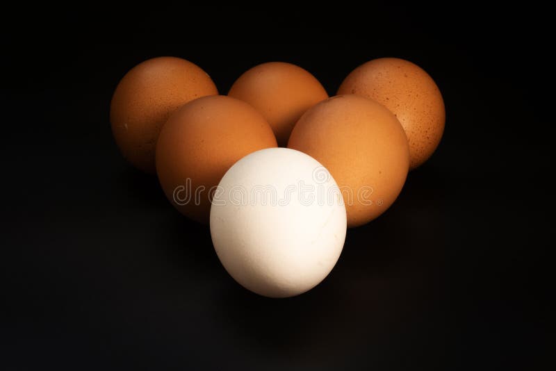 Chicken Eggs in the Form of a Triangle on the Table Stock Image - Image ...