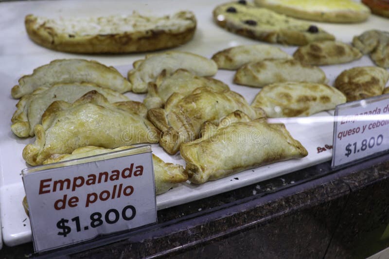 Chicken Empanada in a Display Case at a Pizzeria Stock Image - Image of ...