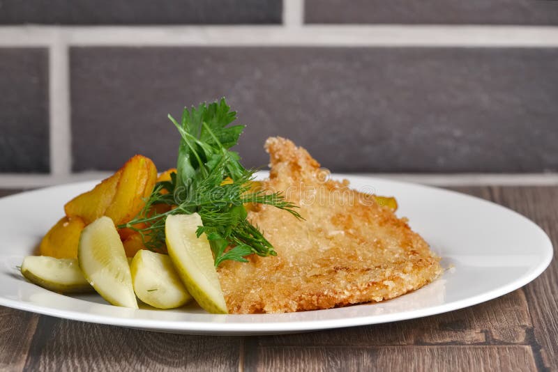 Chicken Entrecote with Potato and Salty Cucumber Stock Photo - Image of ...