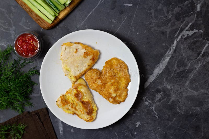 Chicken Fillet in Batter on a White Plate. View from Above Stock Photo ...