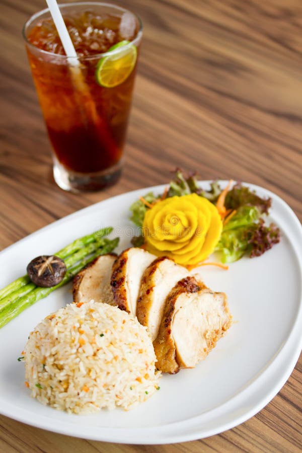 Chicken Fillet with Fried Rice and Lemon Tea Stock Image - Image of ...