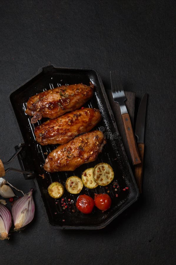 Chicken Grilled on a Black Grill Pan. Horizontal View from Above Stock ...