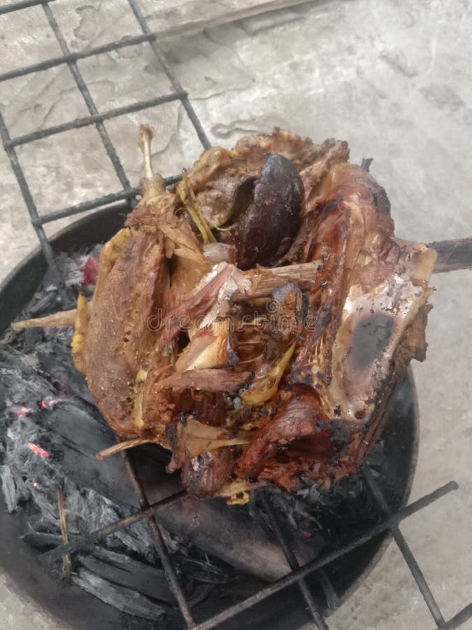 Chicken Grilled Over Coals Made from Coconut Shells? Stock Photo ...