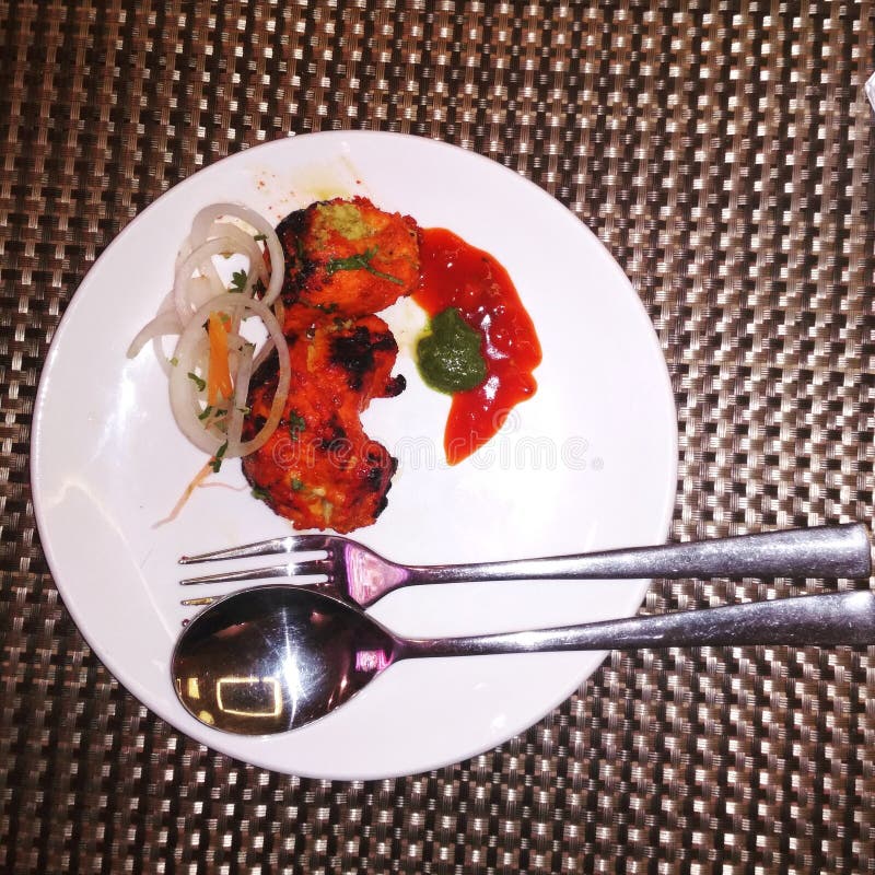 Chicken Kabab on Sticks with Hot Pepper Rice Garnish and Tomato Salad ...