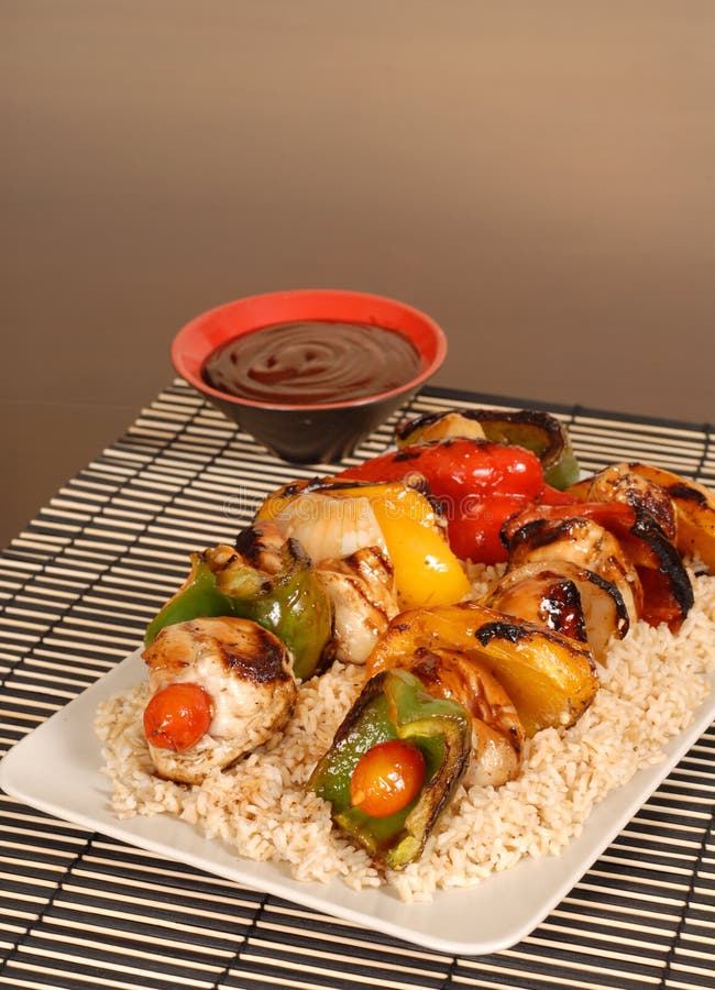 Chicken kabobs on rice stock image. Image of glisten, culinary - 2299033