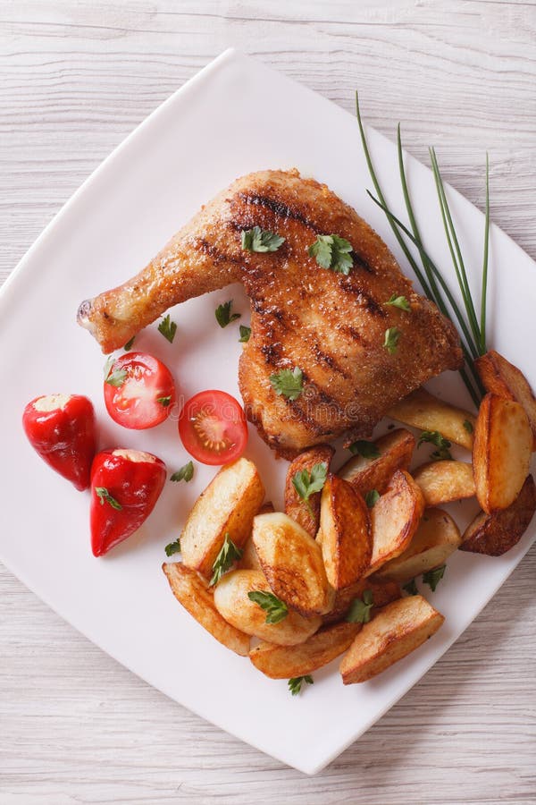Chicken Leg and Chips on a Plate. Top View Vertical Stock Image - Image ...
