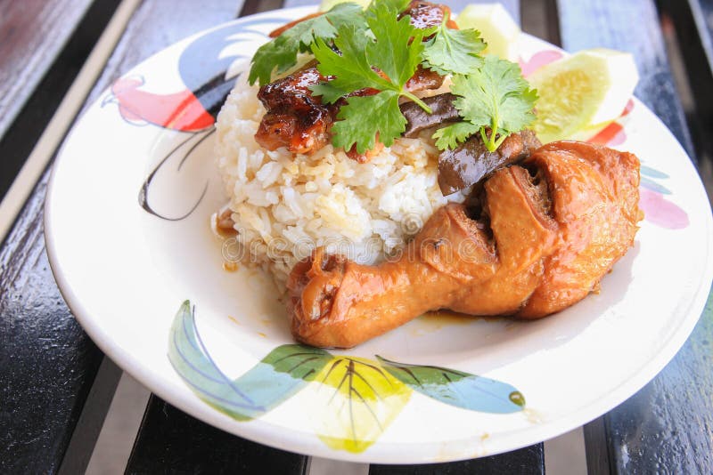 Chicken leg with rice stock photo. Image of food, table - 78776382