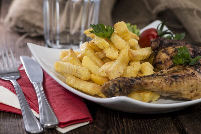 Chicken Legs with chips stock photo. Image of cooked - 33246404