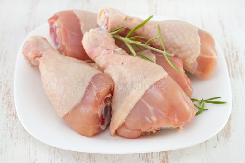 Chicken legs on plate stock photo. Image of eating, meat - 32047824