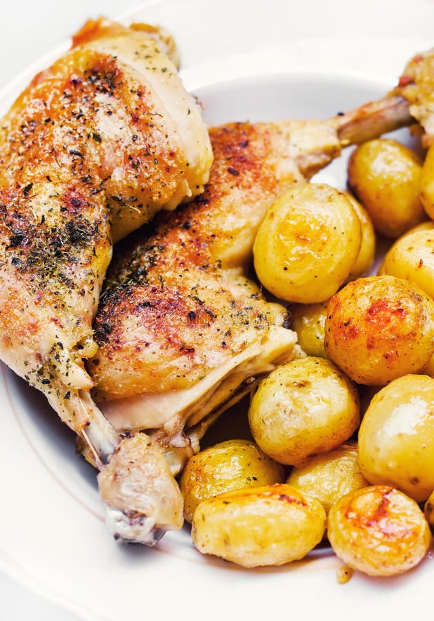 Chicken Legs Served with Baby Potatoes Stock Image - Image of fine ...