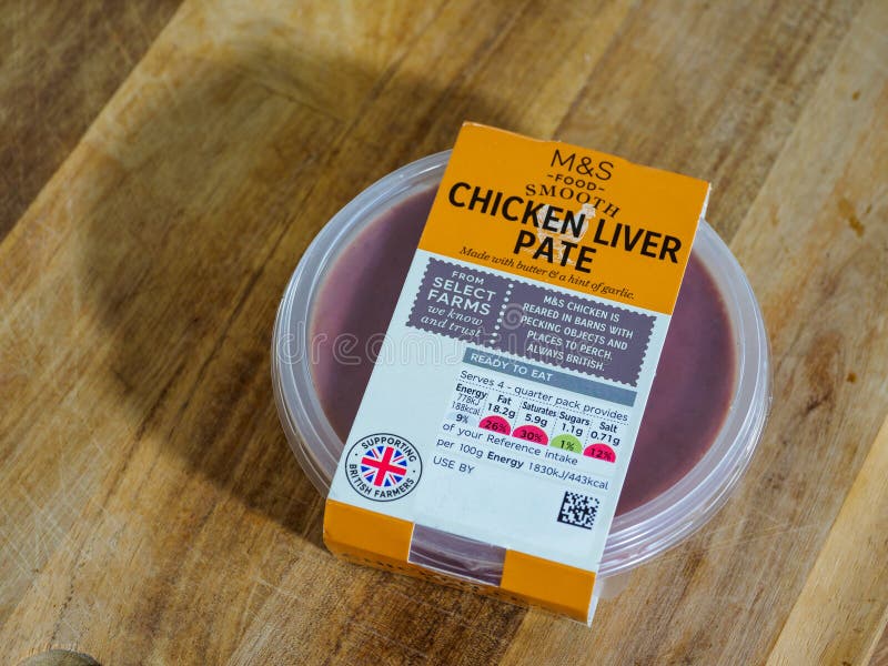 Chicken Liver Pate in a Clear Plastic Container on a Wooden Surface ...