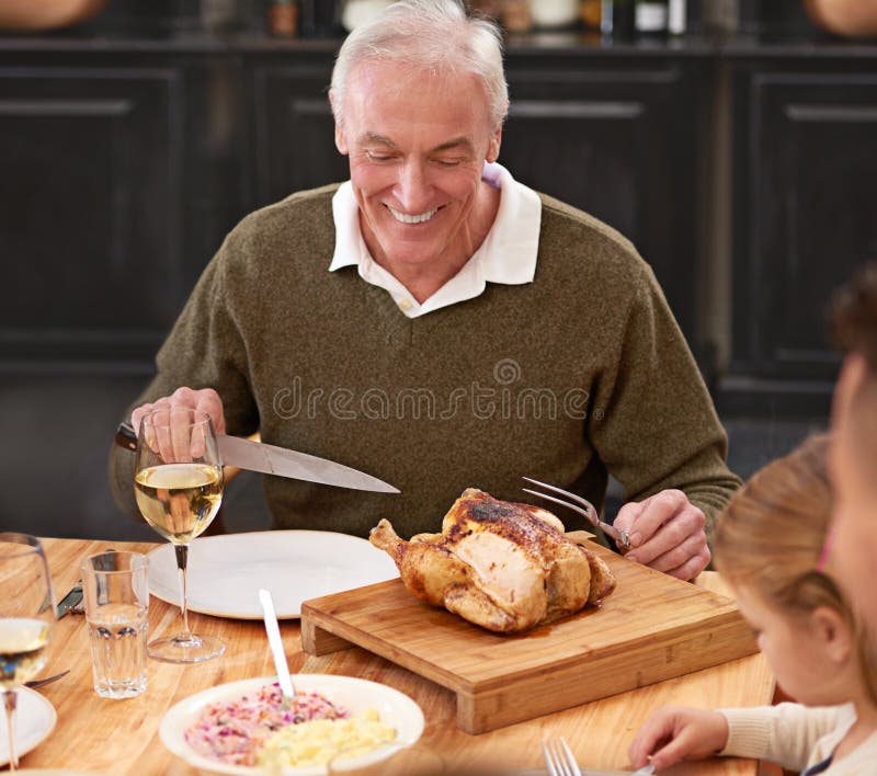 Chicken for Lunch. Shot of a Senior Man Enjoying Some Roast Chicken at ...