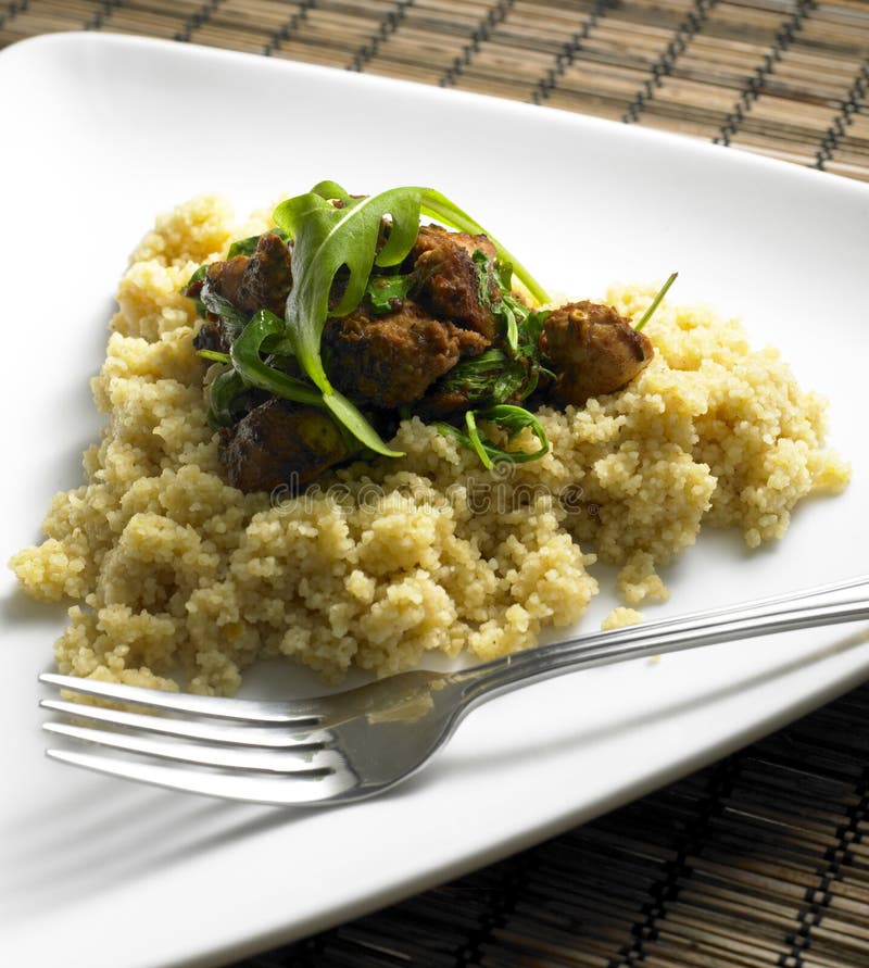 Chicken meat on couscous stock image. Image of interior - 10222865