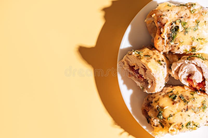 Chicken Meat Rolls on White Plate on Yellow Background Stock Image ...